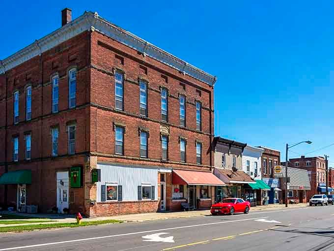 Solid brick buildings line the main drag, their tall windows reflecting a town that's weathered economic storms while keeping its authentic character intact.