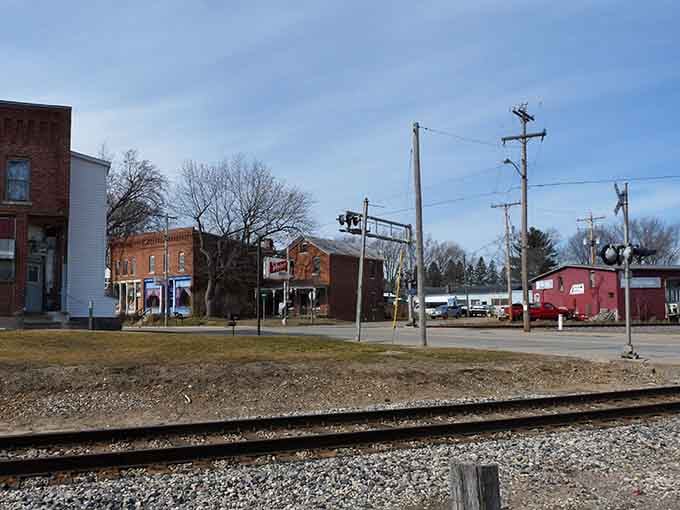 Railroad tracks cutting through town remind you of when these communities were the heartbeat of American commerce and connection.