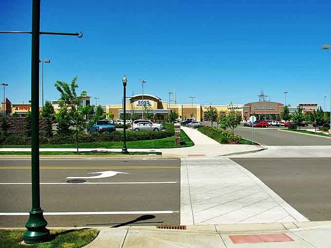 Wide-open shopping centers with pristine sidewalks prove that suburban planning can create both convenience and complete peace of mind.