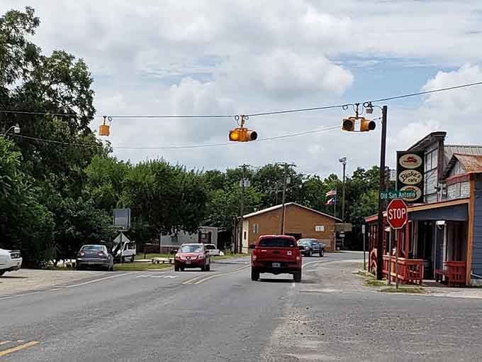 Those hanging traffic lights add character to streets where neighbors still wave at passing cars daily.