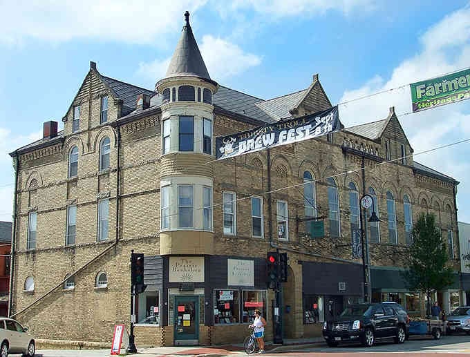 Victorian architecture reaches toward the clouds with turrets and ornate brickwork that would make any castle jealous of its grandeur.