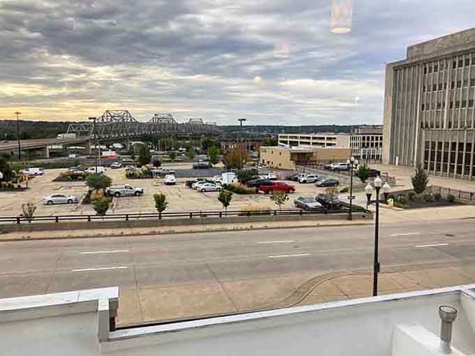 The bridge spanning toward Peoria's riverfront shows how industrial heritage meets modern city life along the mighty river.