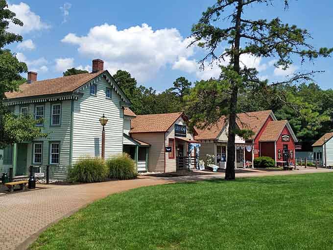 Colorful storefronts and vintage buildings cluster around open green space in this perfectly preserved slice of Americana.