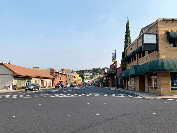 Stone and brick buildings with patriotic flair line streets where Gold Rush history lives in every corner.