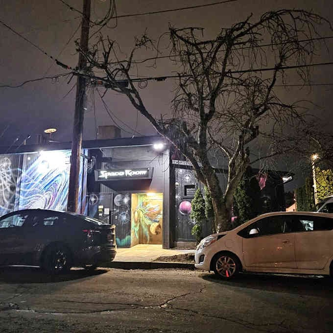 That retro-futuristic sign promises cosmic cocktails and mid-century vibes for earthlings seeking intergalactic happy hour adventures.