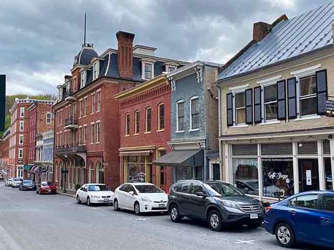 Historic buildings wear their age gracefully on streets where every brick has witnessed generations of daily life unfold.