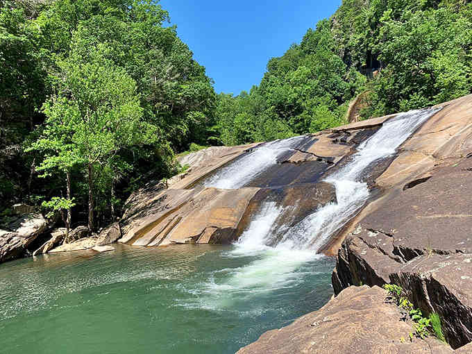 Nature&rsquo;s own tiered cake! This waterfall cascades over rock slabs with a cool, refreshing mist that cleanses the soul.