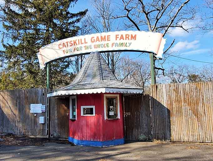 The cheerful red-and-blue ticket booth stands ready to welcome families seeking old-fashioned fun where memories were made for decades past.