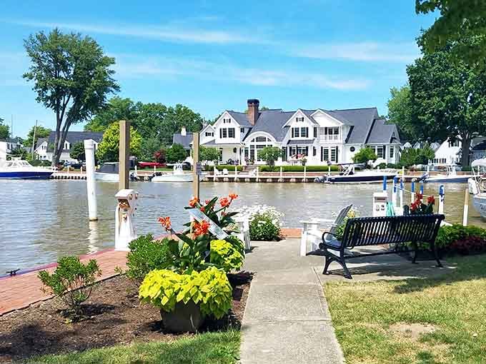 Colorful planters and waterfront views create a harbor scene that belongs on a travel magazine cover today.