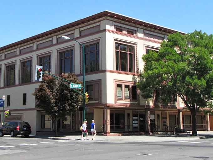 Elegant trim work adorns this corner building like frosting on a wedding cake, showing craftsmanship that's becoming rare.