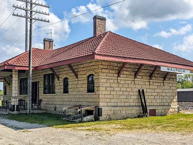Solid limestone blocks form this historic depot where travelers once waited for trains that connected small towns to big dreams.