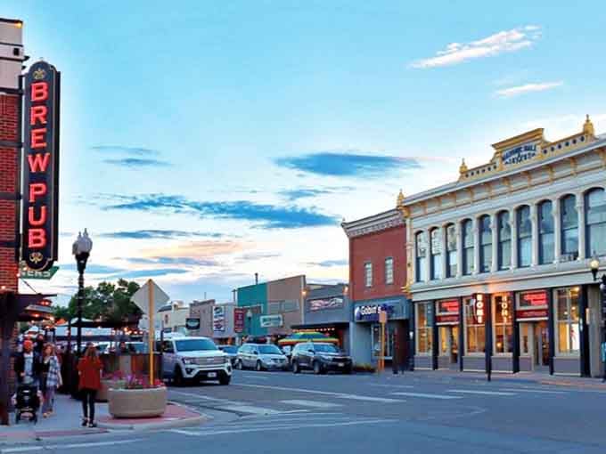 Classic storefronts catch afternoon sun while wide streets invite leisurely strolls through this welcoming mountain community's heart.