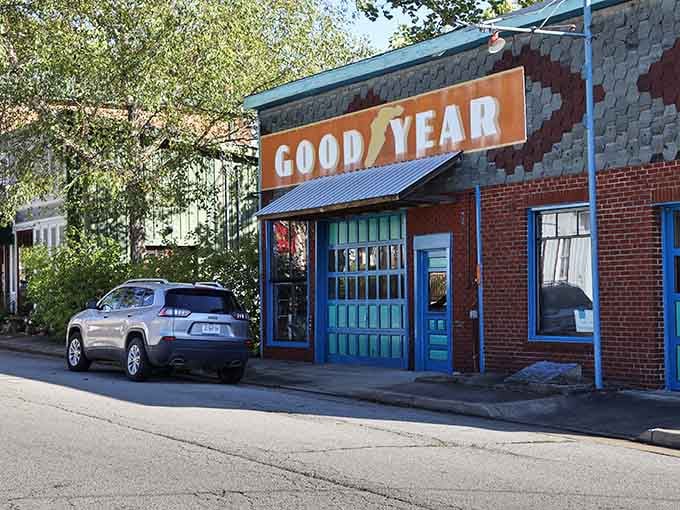That vintage Goodyear sign pops against turquoise doors, proving small towns know how to preserve character while staying vibrant and relevant.