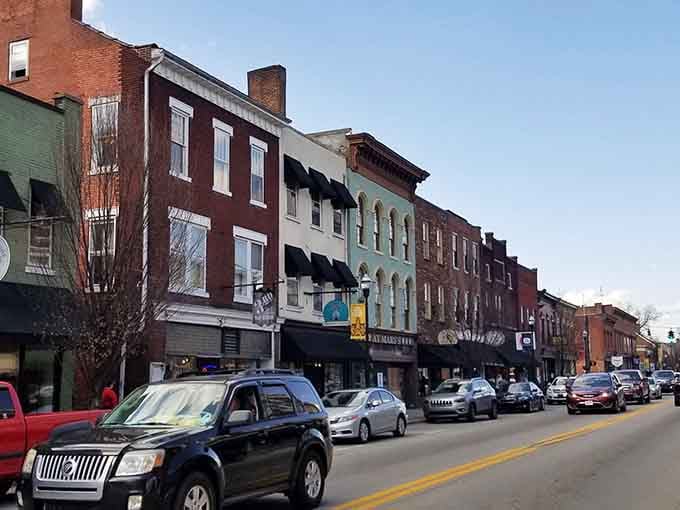 Local businesses cluster together like old friends, each storefront contributing to the community's authentic small-town fabric.