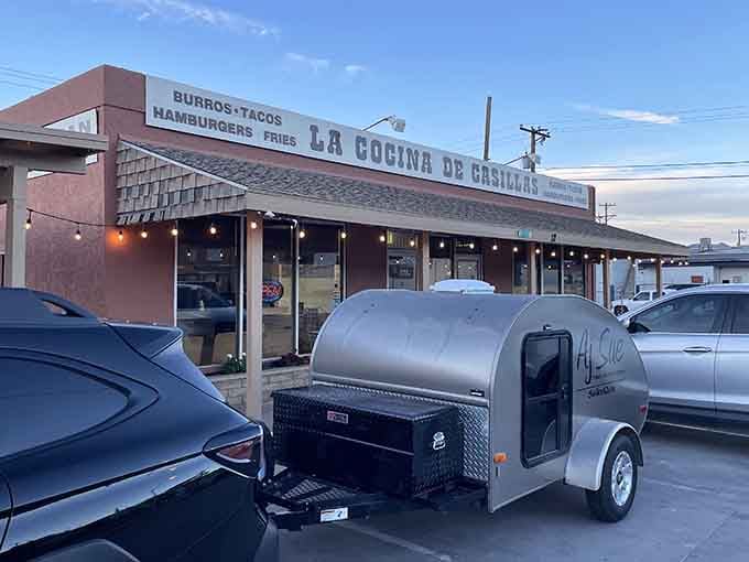 The evening glow illuminates a parking lot full of locals who know exactly where to find great burgers.
