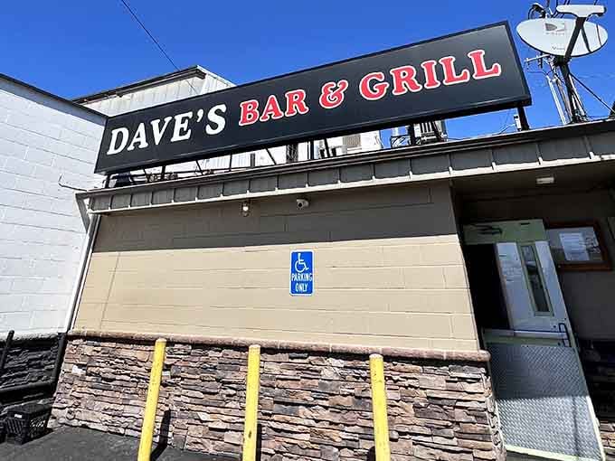 That bold rooftop sign means business, standing tall like a beacon for anyone craving honest bar food done right.