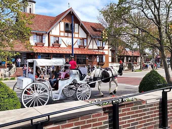 Horse-drawn carriages clip-clop past timber-framed buildings, making every day feel like a festive Old World celebration.