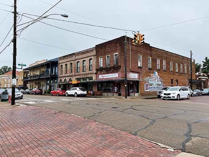 These historic buildings wear their age gracefully, their brick facades glowing warm in the afternoon light like old friends reuniting.