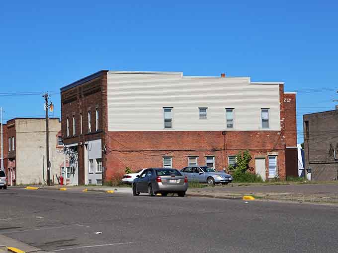 Weathered brick tells stories of generations past in this authentic downtown where character comes standard, not premium.