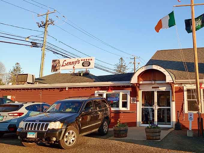 Golden hour light bathes the building as flags flutter overhead, promising good times and great catches inside those doors.