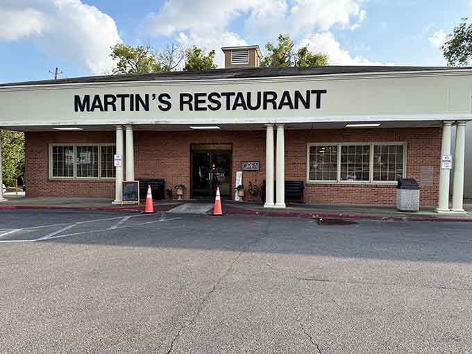 The clean, welcoming facade and ample parking promise a no-fuss dining experience where good food takes center stage beautifully.