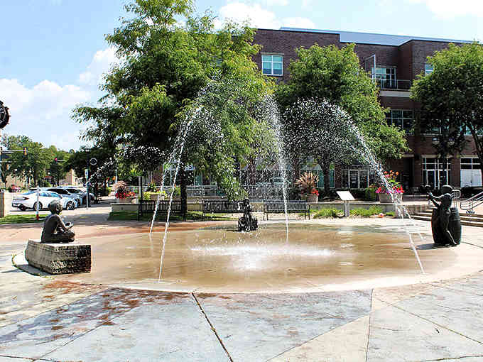 Downtown fountains dance and splash, turning an ordinary plaza into a refreshing oasis on hot summer days.