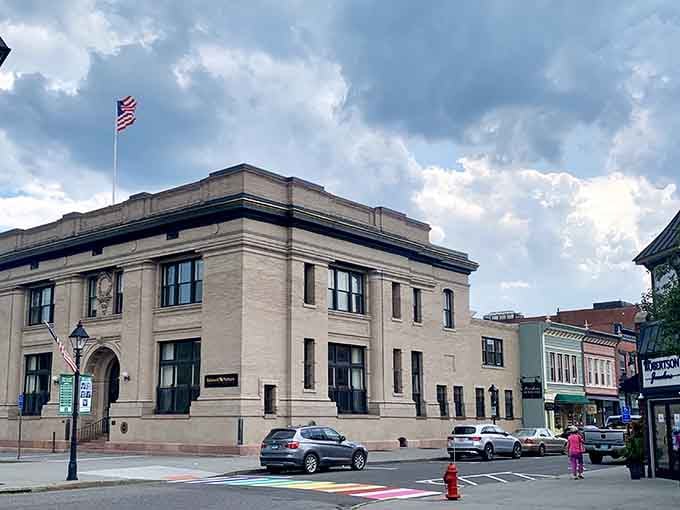 The classic architecture and friendly community spirit shine brightly under a beautiful sky in the heart of New Milford