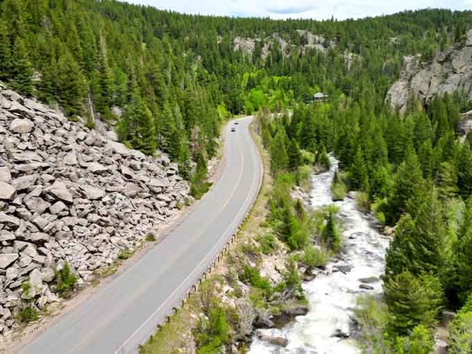 The scenic route follows a rushing creek through forests so green they look freshly painted each morning.
