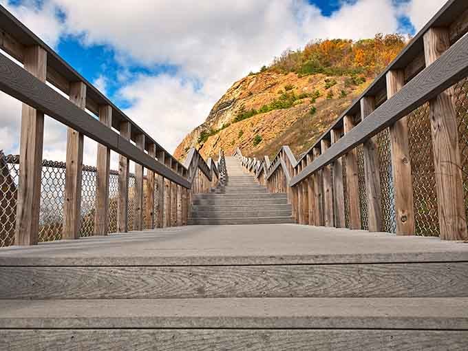 Climb these stairs toward striped rock walls, and you're literally walking into a geology textbook come magnificently to life.