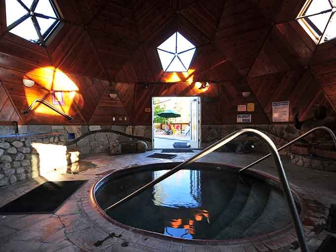 Inside this architectural wonder, geometric skylights frame your soak like a postcard from the future's favorite spa.