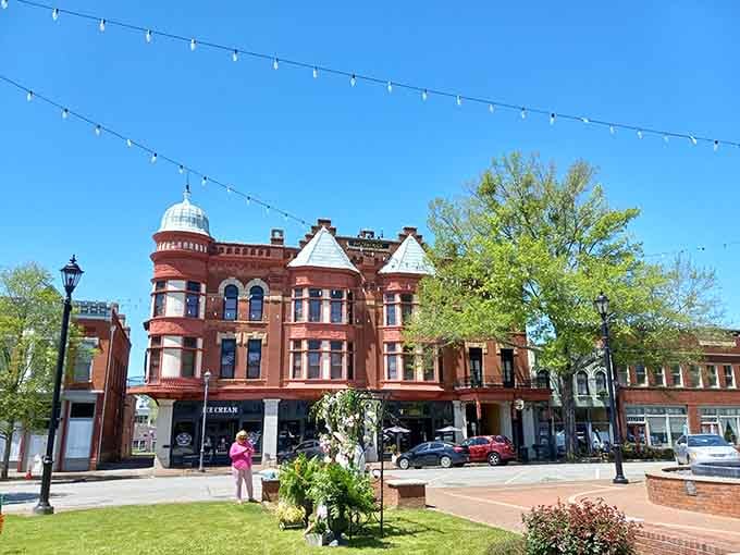 That ornate red brick building with its tower could be the star of any classic movie about small-town America.