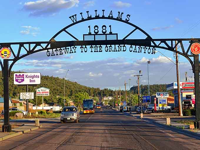 Golden hour light bathes this gateway town, where Route 66 meets Grand Canyon dreams perfectly.