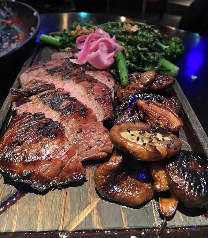 Flank steak platter that proves meat and mushrooms can absolutely share the spotlight without anyone getting jealous.