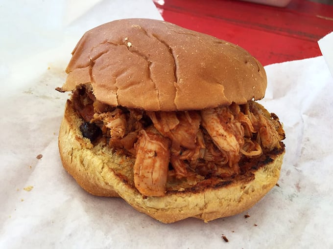 Pulled chicken piled high on a bun, proving simplicity and perfection are often the same thing.