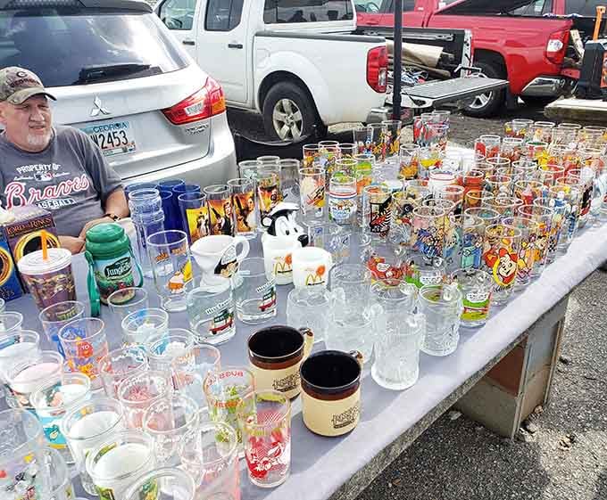 Collectible glasses lined up like a nostalgia parade, featuring characters that'll make you remember Saturday morning cartoons and simpler times.