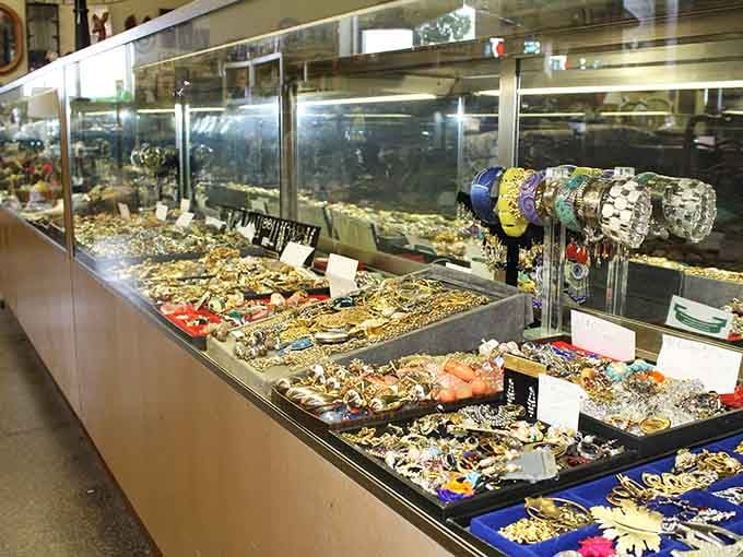 Jewelry cases gleaming with vintage sparkle, proving grandma's taste was actually pretty spectacular.