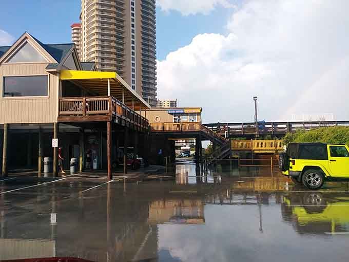 The pier house stands ready to fuel your ocean adventure with supplies, sustenance, and maybe some arcade nostalgia.
