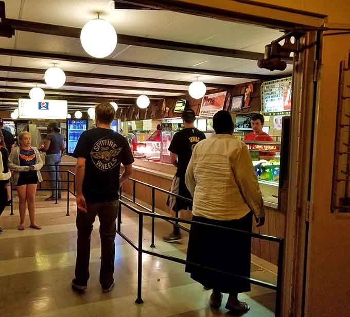 The concession stand where popcorn dreams come true and nobody judges your snack choices or quantities.
