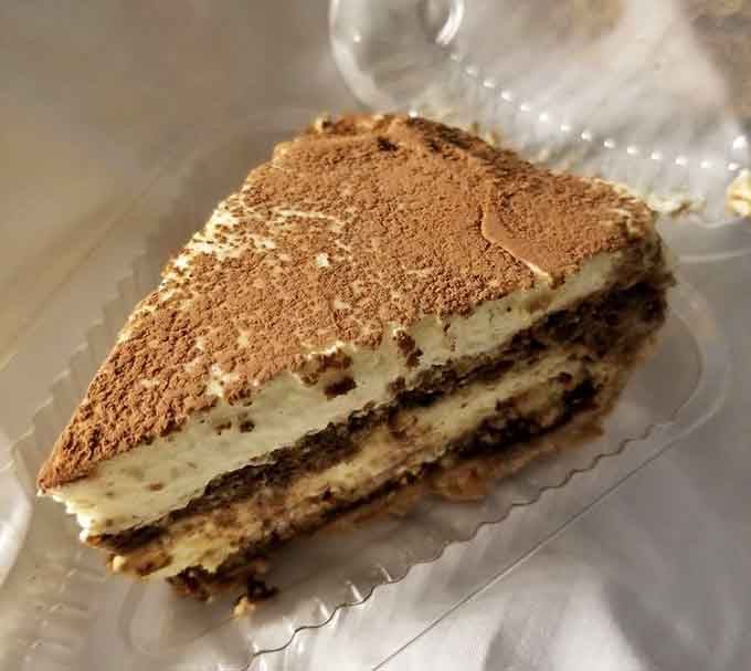 Layers of coffee-soaked cake and cream dusted with cocoa, bringing a little Italian elegance to Western North Carolina.