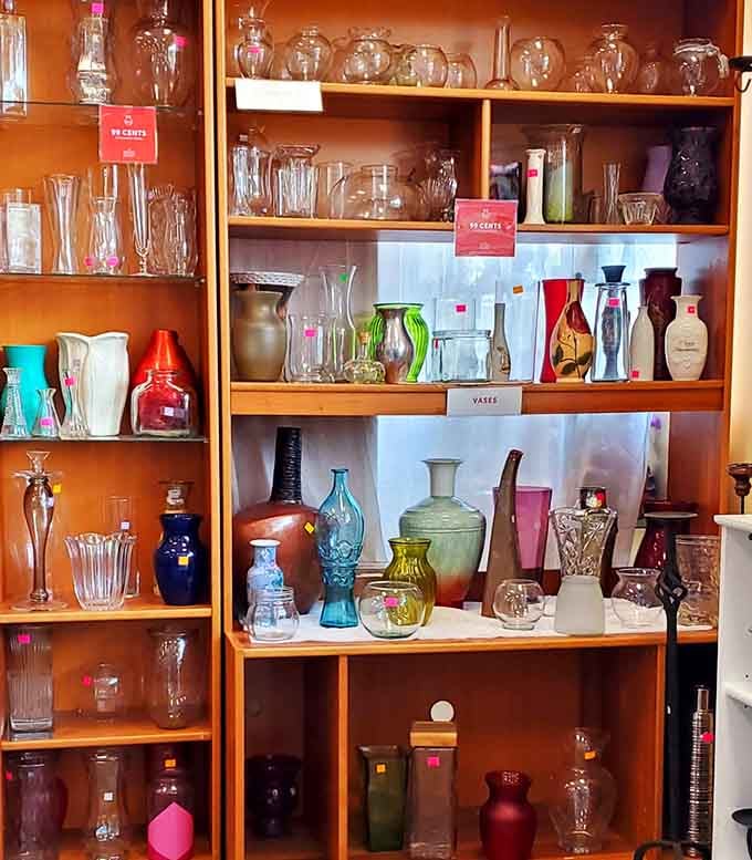 Vintage vases in jewel tones catch the light beautifully, transforming ordinary glassware into affordable art pieces.