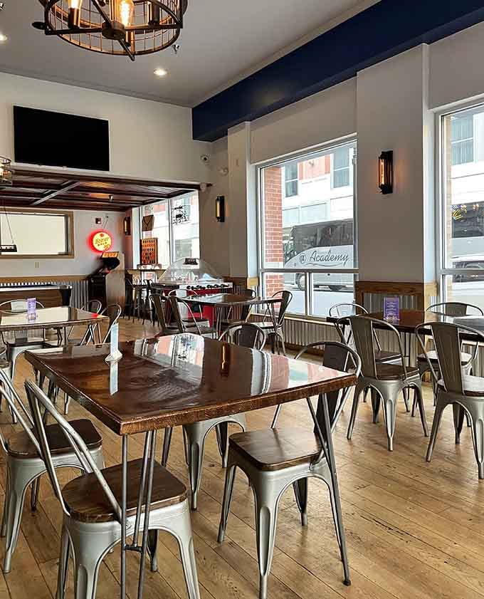 The dining area blends modern comfort with retro charm, where good food meets great games seamlessly.