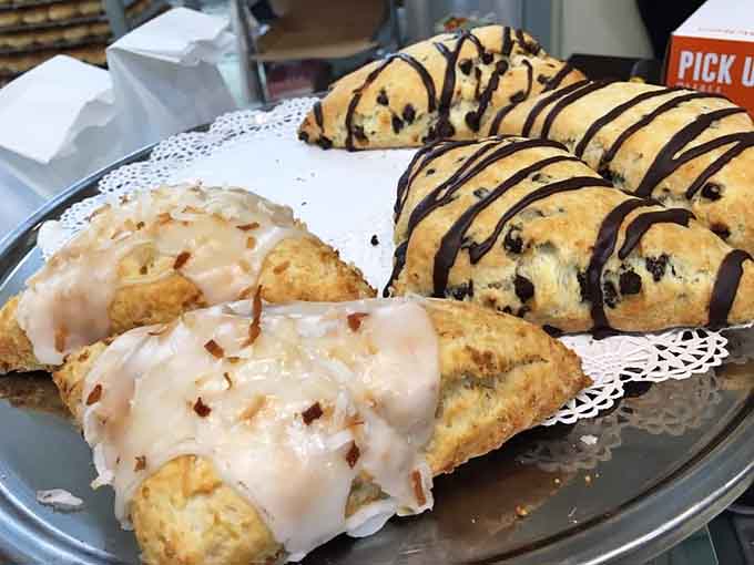 Scones that understand the assignment, generously glazed and ready to make your morning infinitely better than expected.