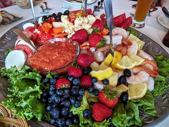 This antipasto tower with fresh shrimp, berries, and vegetables is like edible architecture for your table.