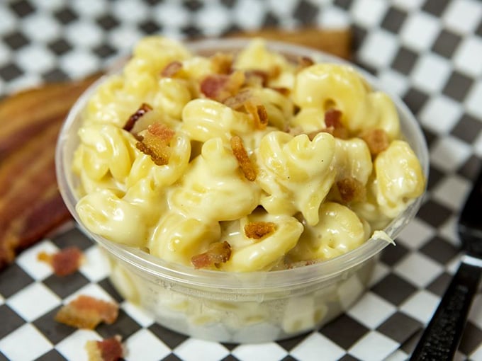 Mac and cheese with bacon bits represents everything right with American comfort food in one glorious bowl.