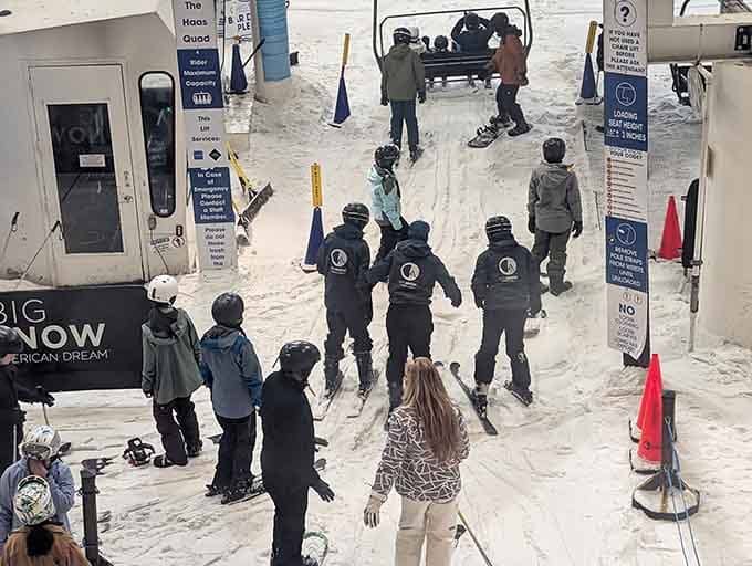 The beginner area welcomes newcomers with patient instructors who understand that not everyone was born on skis.