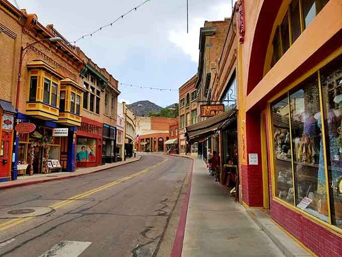 Storefronts painted in sunset hues line streets where window shopping becomes an actual sport worth pursuing all afternoon.