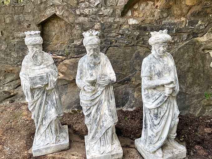 The Three Wise Men stand ready in their rocky alcove, looking like they've been waiting centuries for visitors.