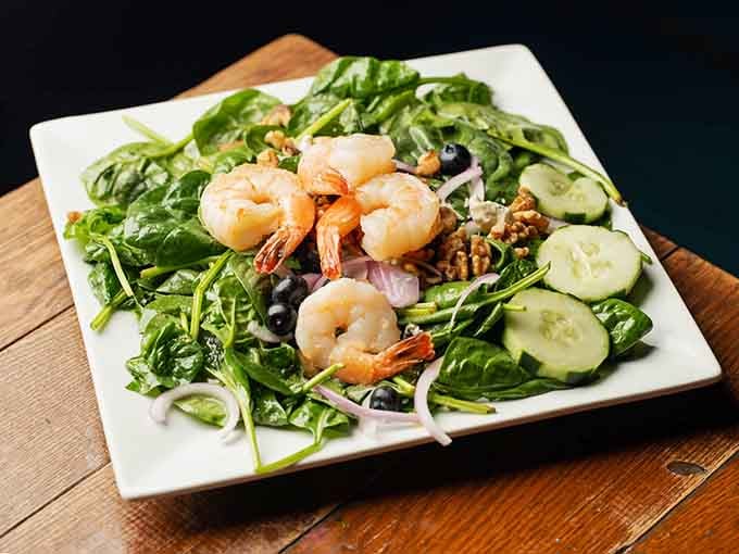 Fresh greens topped with plump shrimp prove that eating healthy doesn't mean sacrificing flavor or fun.