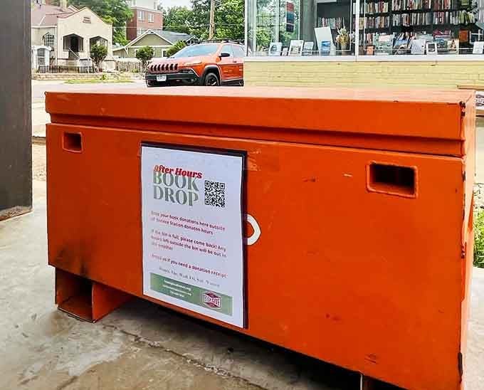 The bright orange after-hours book drop ensures your donations are welcome even when volunteers are home resting.