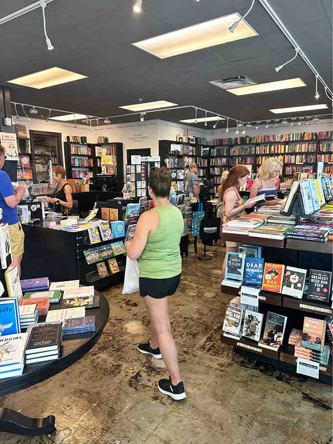 Browsers explore the aisles with that unmistakable look of people about to discover their next favorite read.